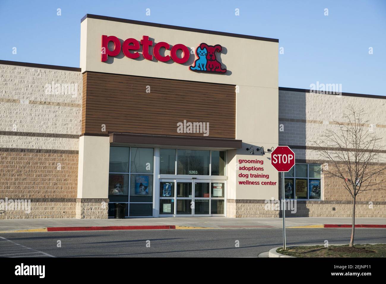 A logo sign outside of a Petco retail store location in Nottingham ...