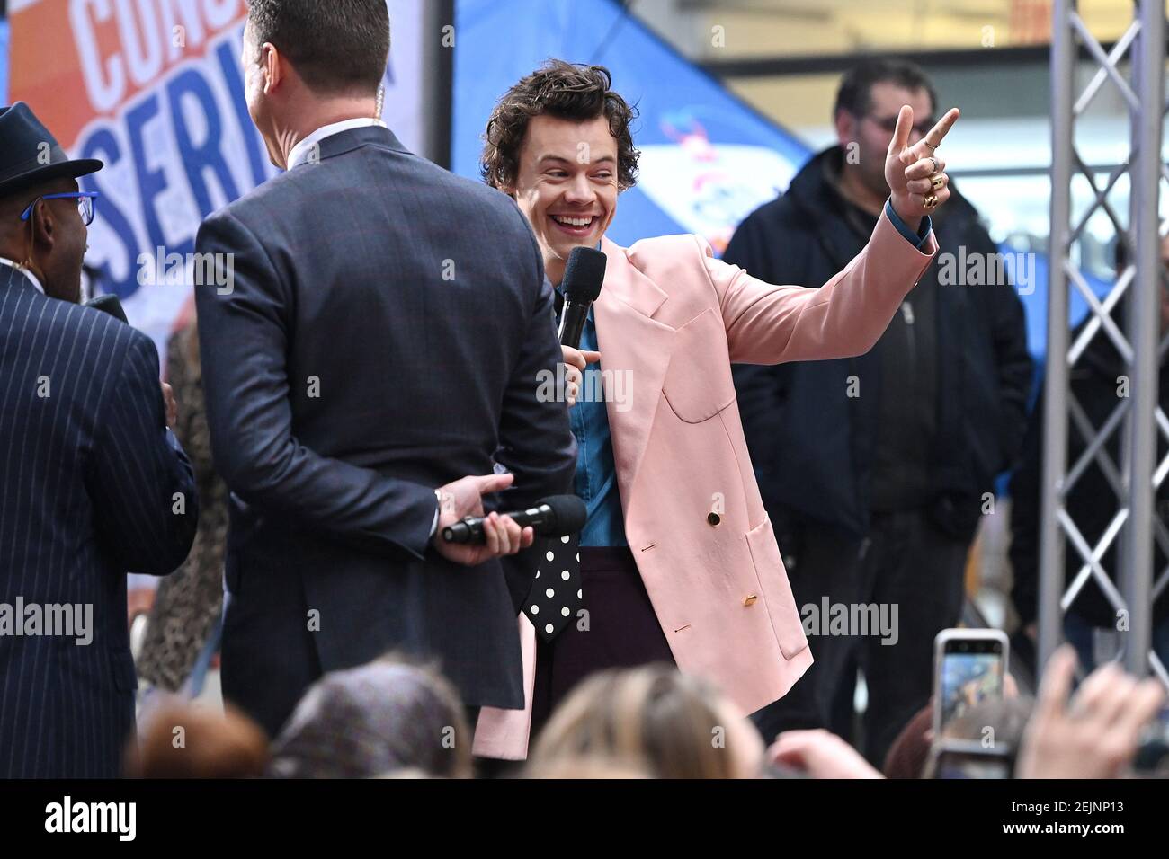 Singer Harry Styles waves to fans between performances live on NBC’s ...