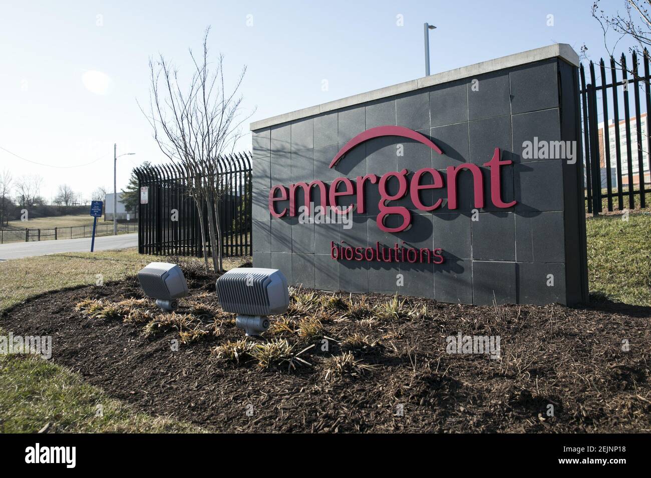 A logo sign outside of a facility occupied by Emergent BioSolutions in ...