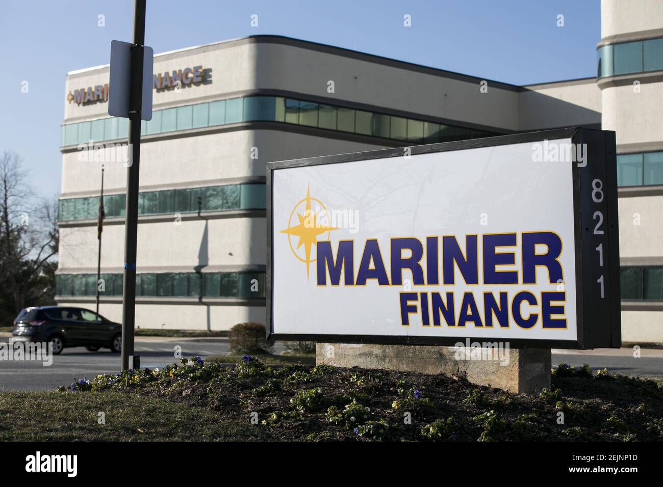 A logo sign outside of the headquarters of Mariner Finance in Baltimore ...