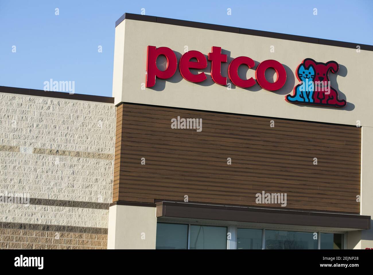 A logo sign outside of a Petco retail store location in Nottingham ...