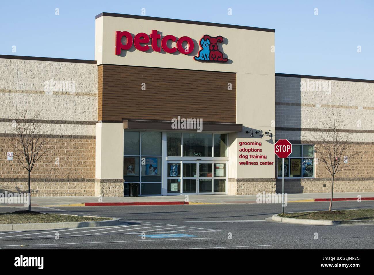 A logo sign outside of a Petco retail store location in Nottingham ...