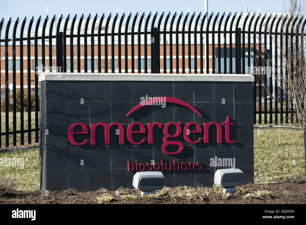 A logo sign outside of a facility occupied by Emergent BioSolutions in ...