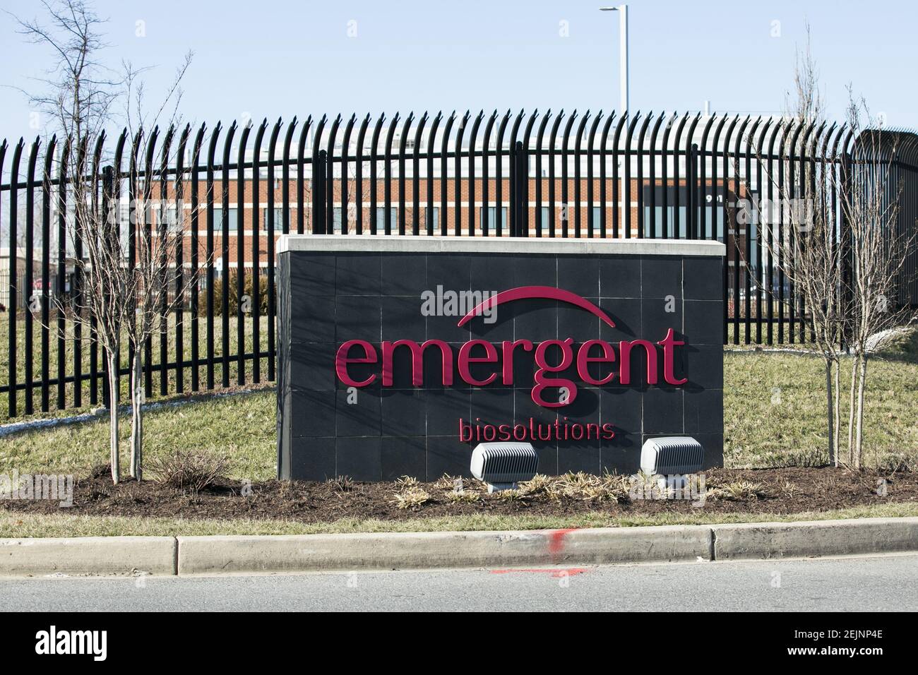 A logo sign outside of a facility occupied by Emergent BioSolutions in ...