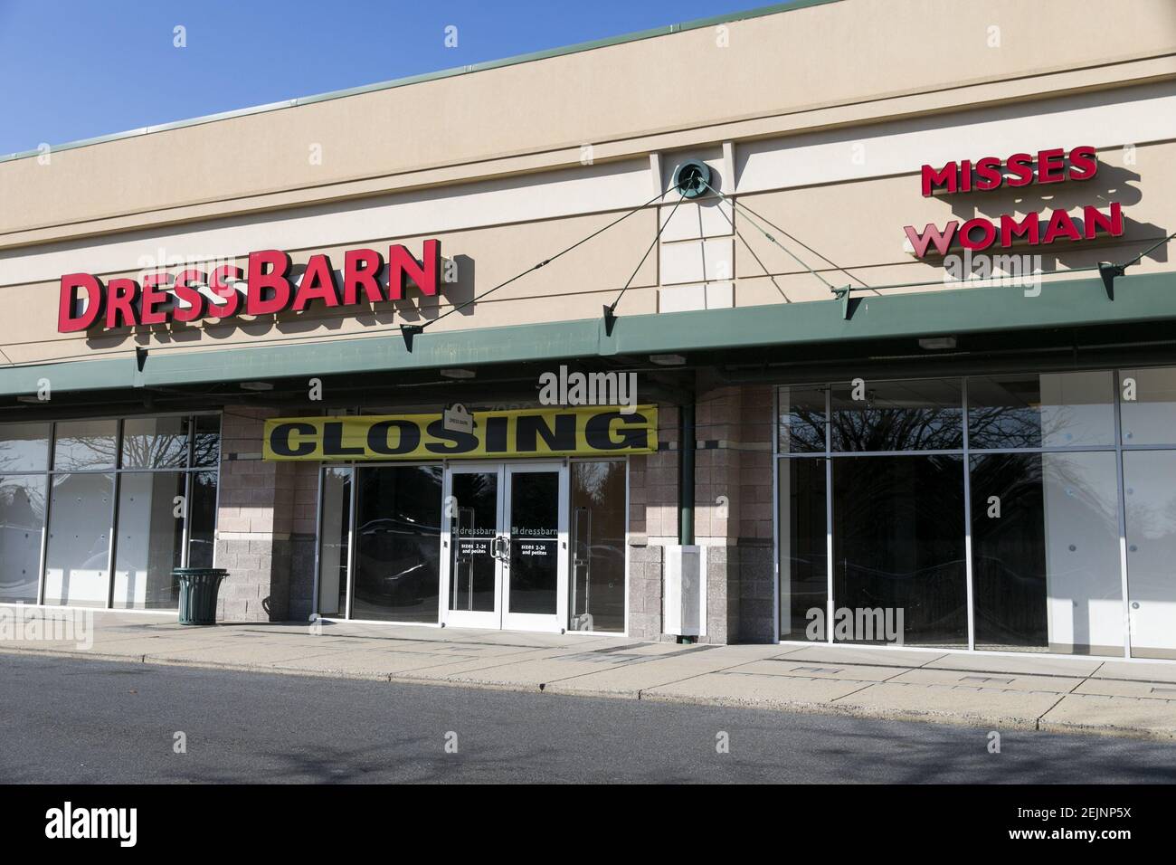 'Store Closing' signage outside of a Dressbarn retail store location in ...