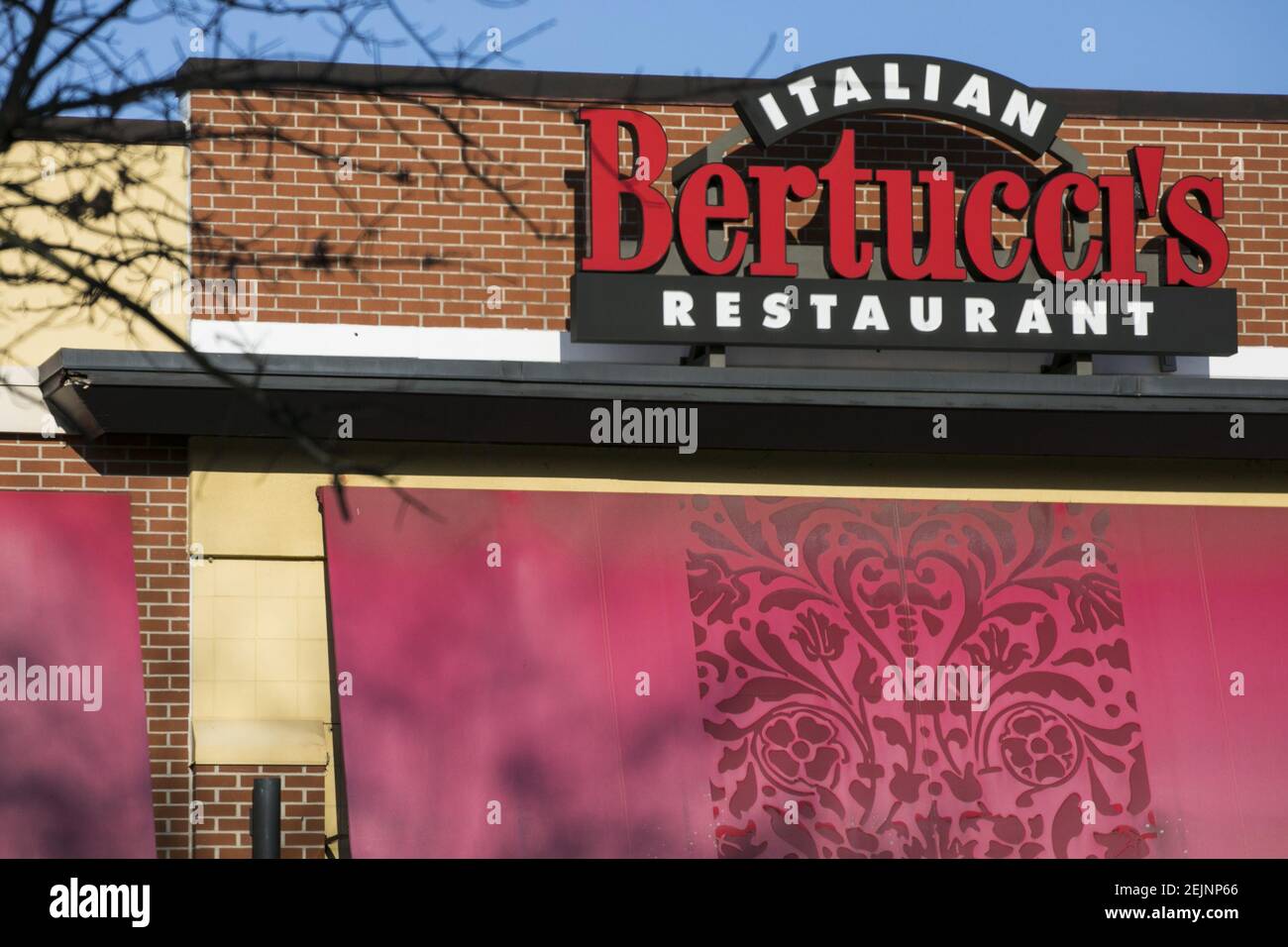 A logo sign outside of Bertucci's restaurant location in Baltimore ...