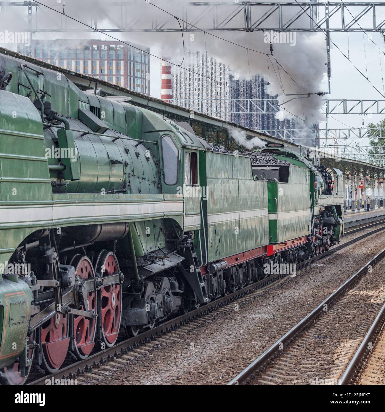 Steam retro train departs from the station Stock Photo - Alamy