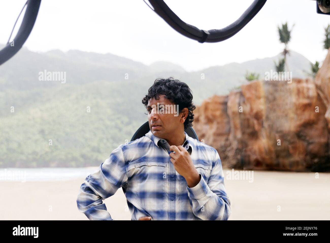 OLD, director M. Night Shyamalan, on set, 2021. ph: Phobymo ...
