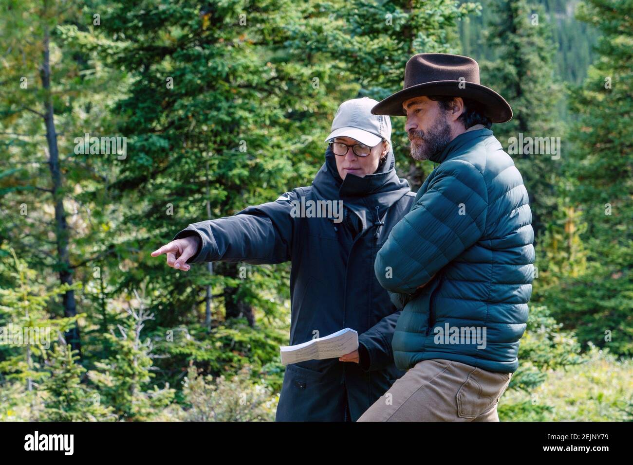 LAND, from left: director Robin Wright, Demian Bichir, on set, 2021. ph ...