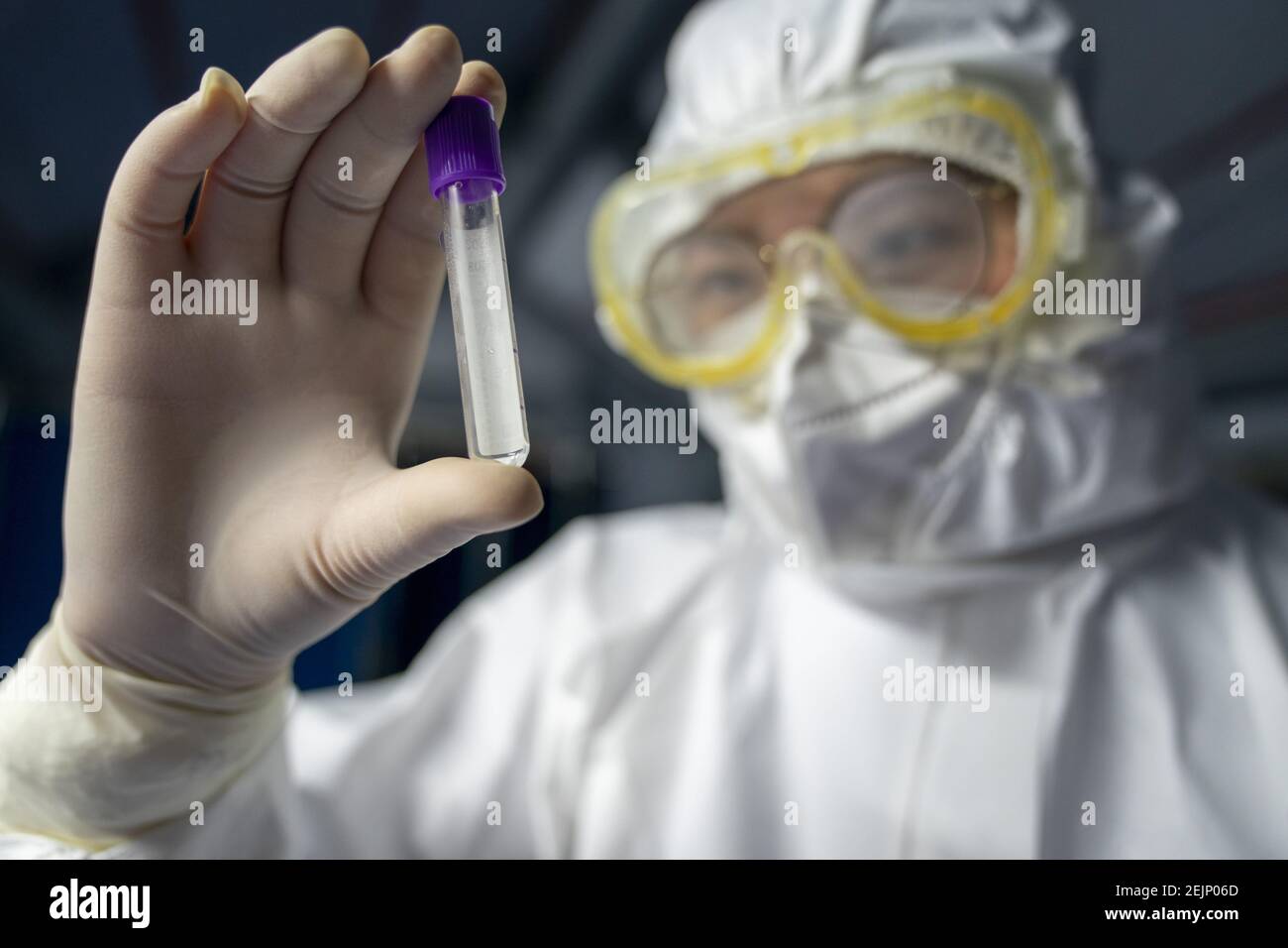 A well-protected Chinese medical worker is on duty at a hospital in ...