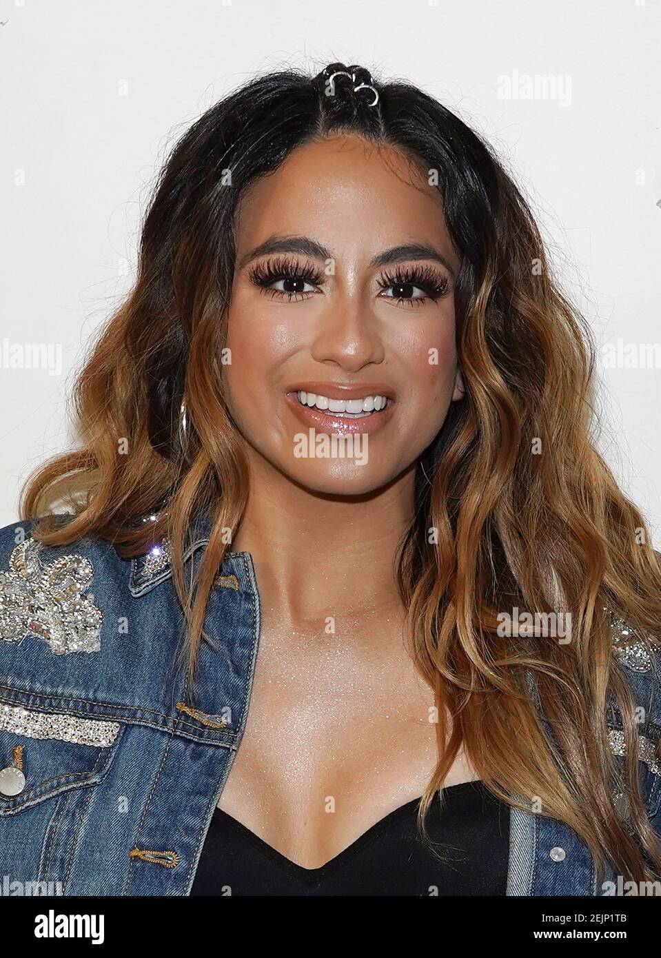 MIAMI, FL - FEB 27: Singer Ally Brooke poses backstage during ...