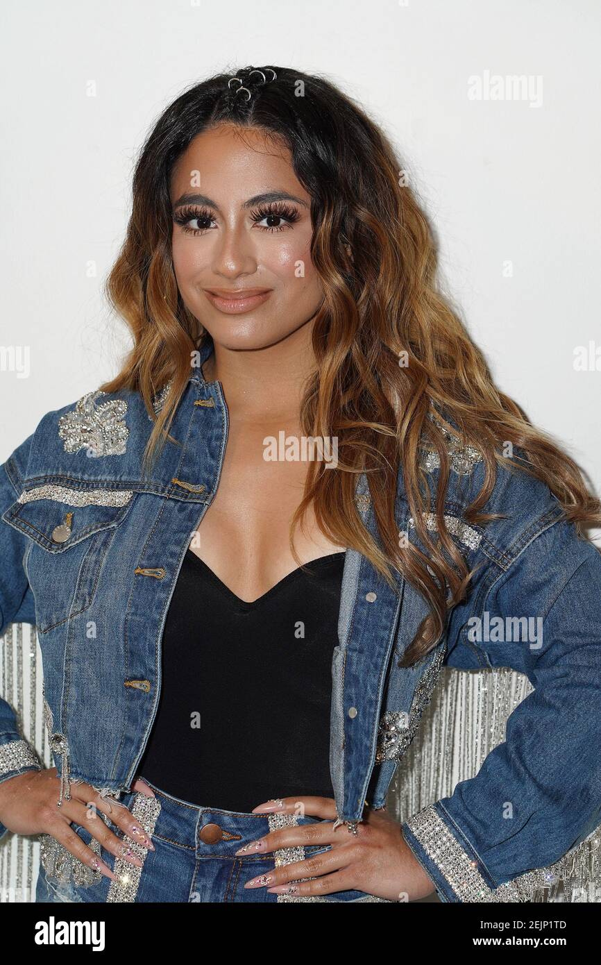 MIAMI, FL - FEB 27: Singer Ally Brooke poses backstage during ...