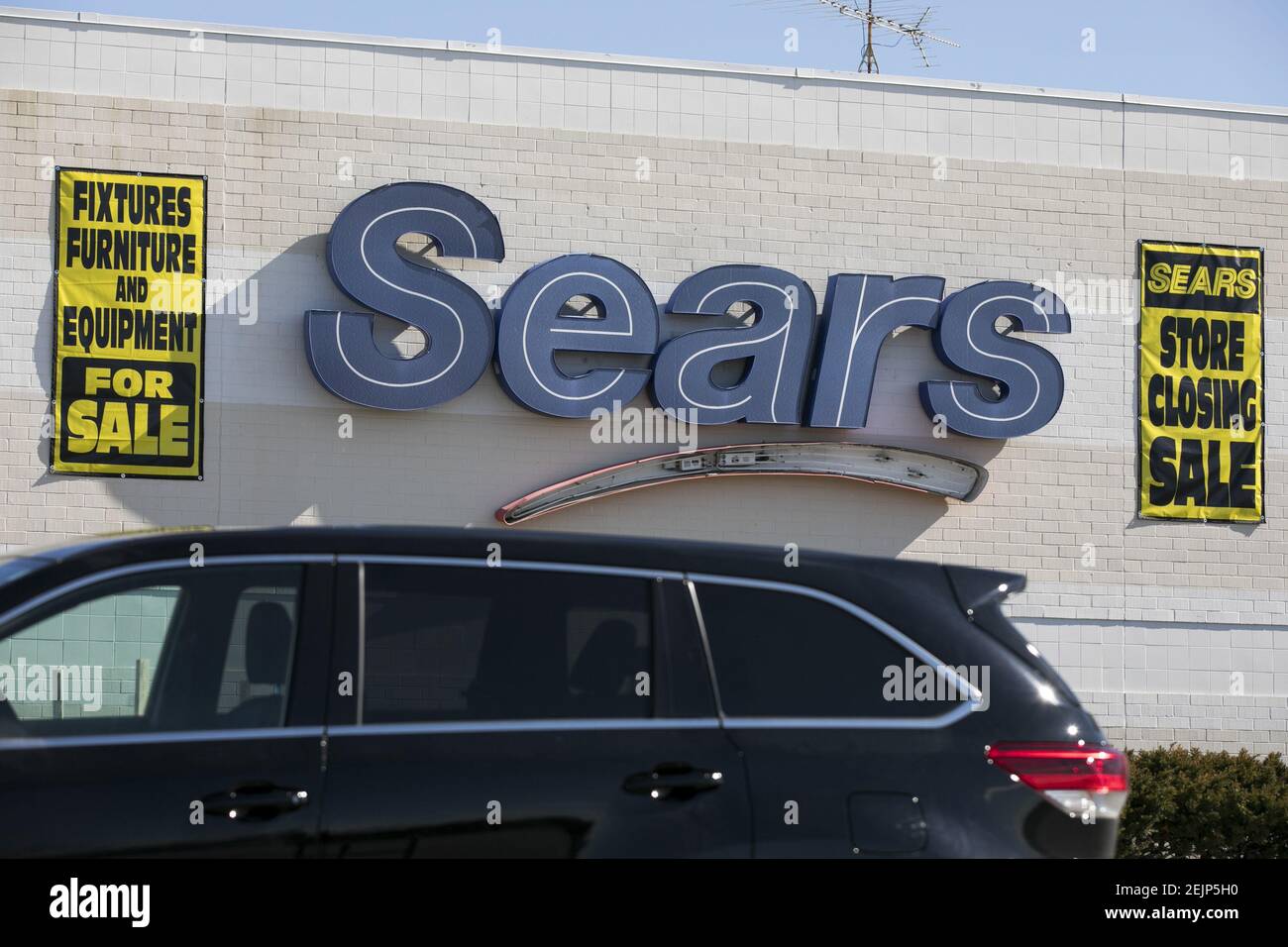 A 'Store Closing' outside of a soon to be closed Sears retail store ...