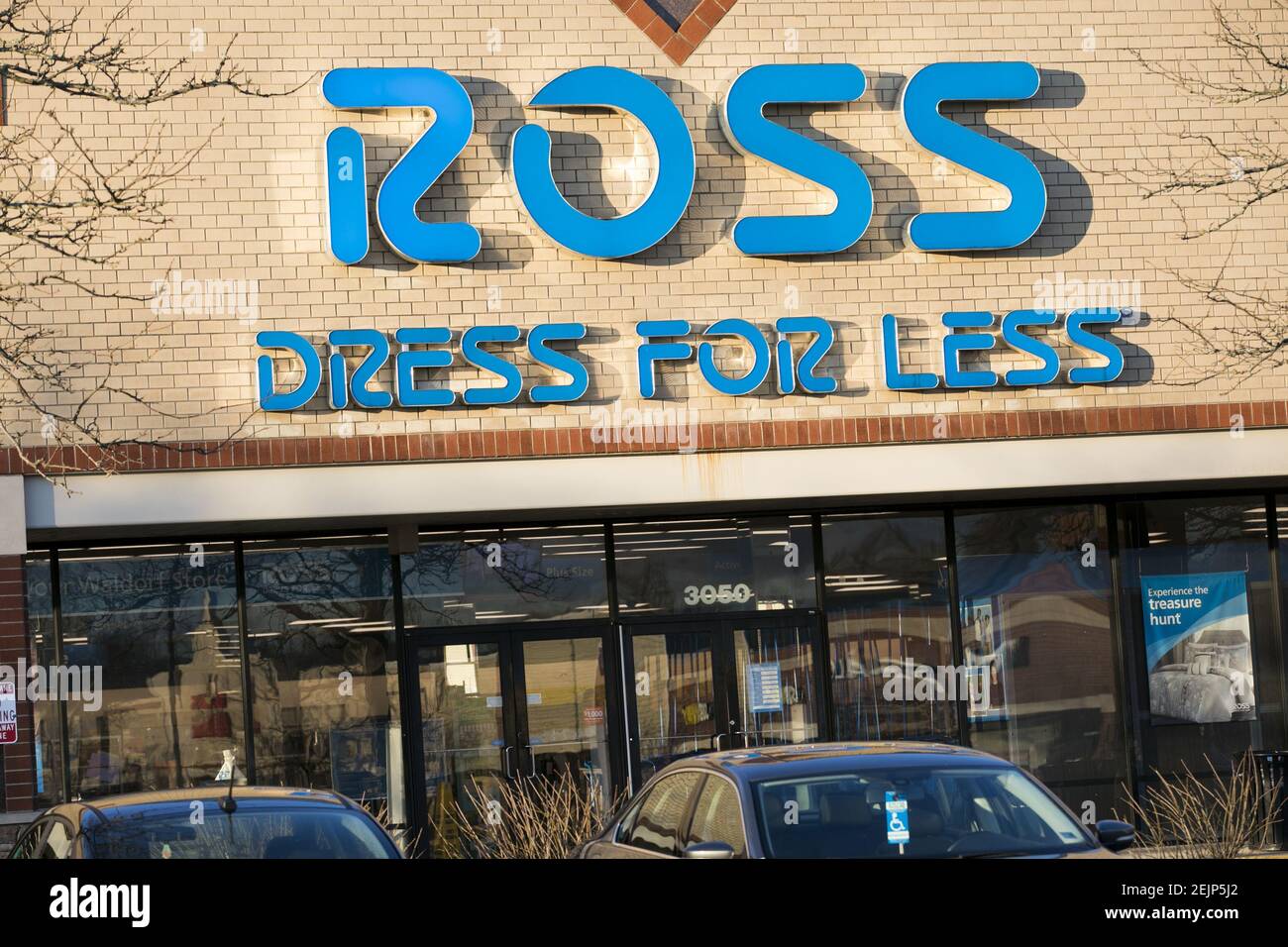 A logo sign outside of a Ross retail store location in Waldorf ...