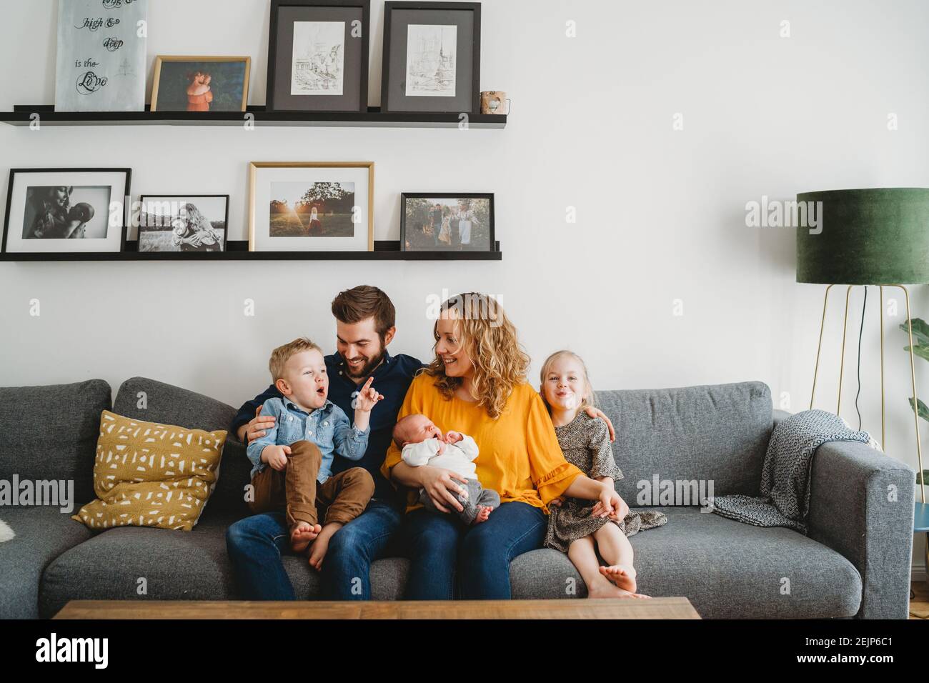 Family couch girl mum hi-res stock photography and images - Alamy