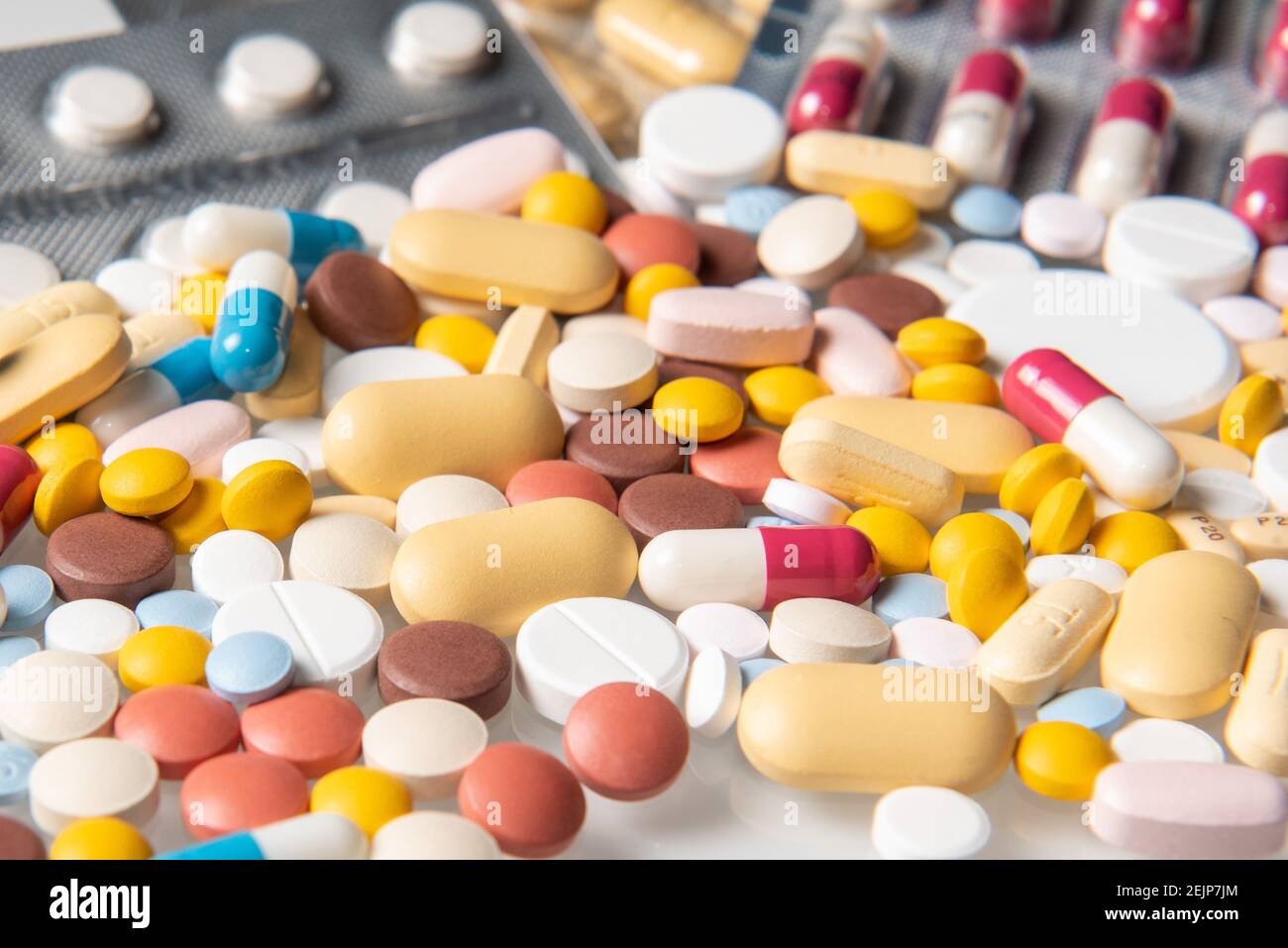 In this photo illustration, pharmaceutical pills and capsules seen ...