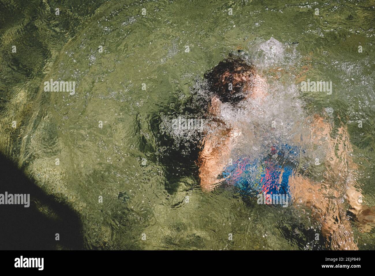 Boy Submerged Under Water Makes Bubbles Stock Photo - Alamy
