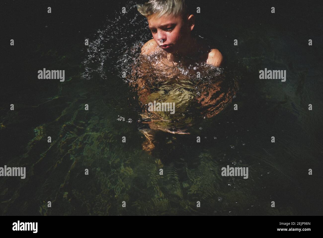 Breaking through surface hi-res stock photography and images - Alamy