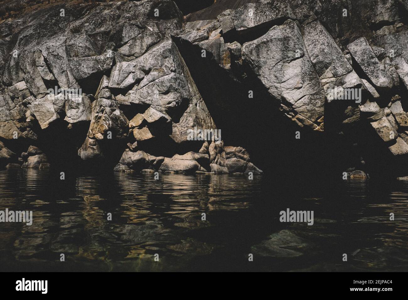 Light and Shadows on Rocks and Water Stock Photo - Alamy