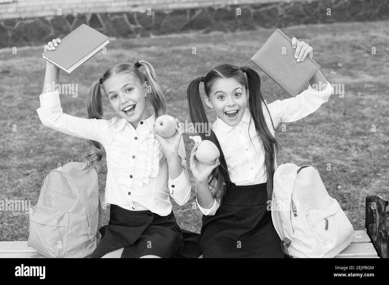Happy school friends little girls having fun, back to school concept ...