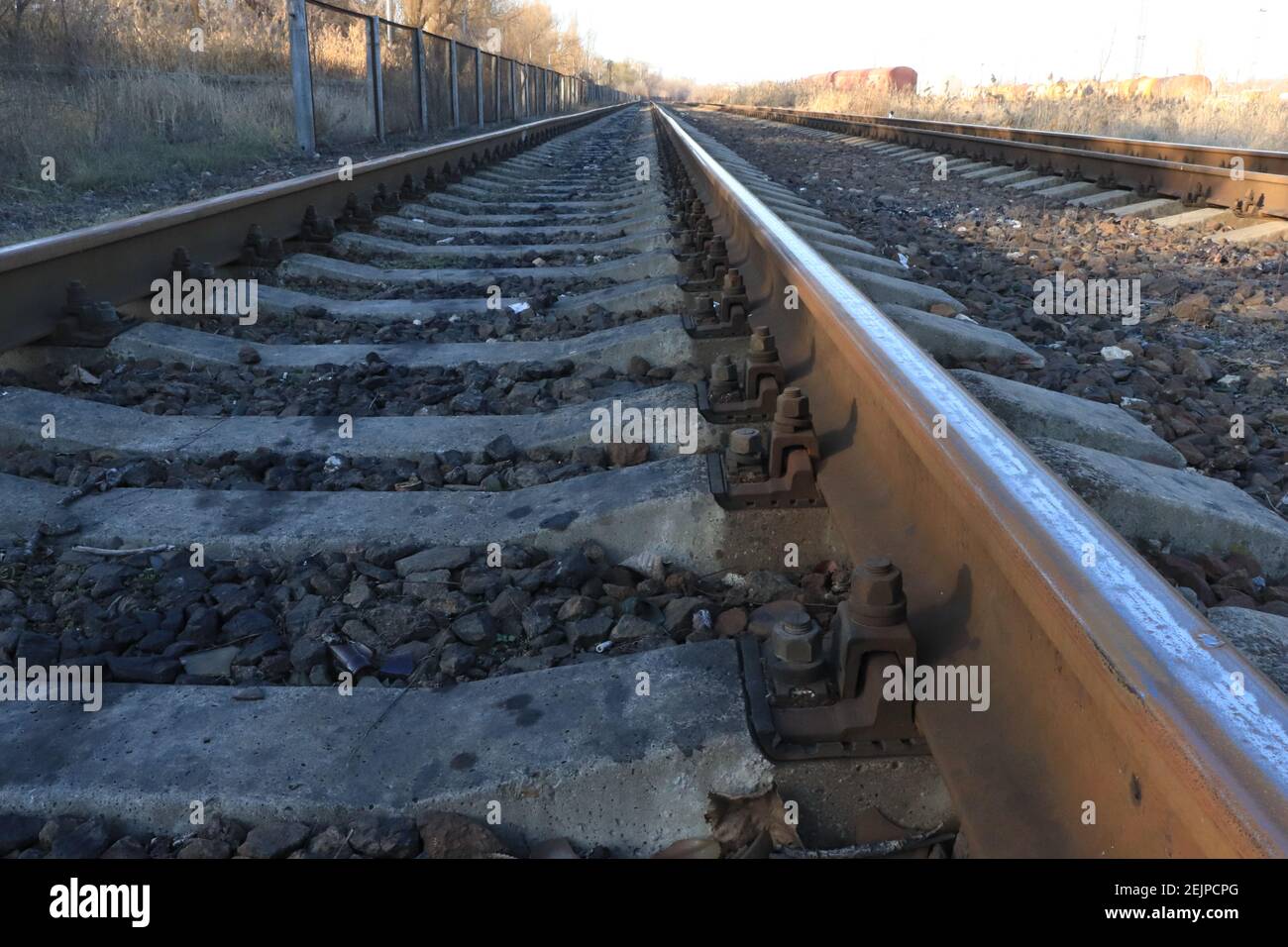 summer walk on abandoned railway tracks, old rusty tracks Stock Photo ...