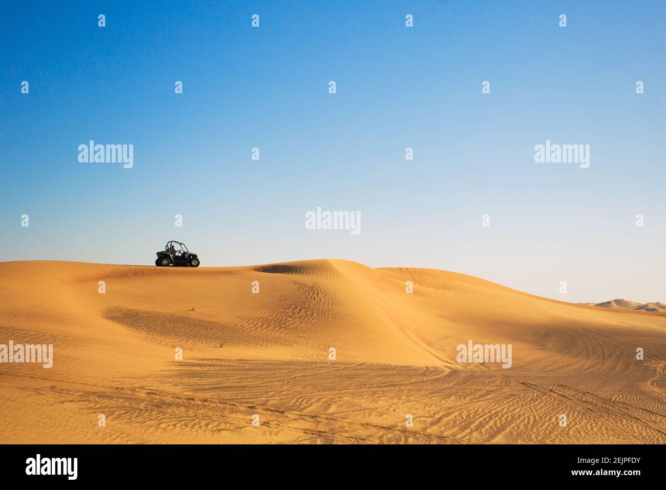 View of riding buggy quad bike in desert dune Al Awir near Dubai Stock ...