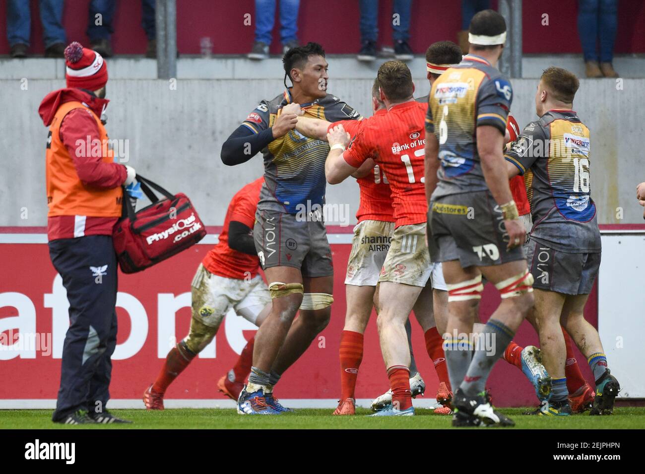 Sam Lousi of Scarlets punched JJ Hanrahan of Munster during the ...