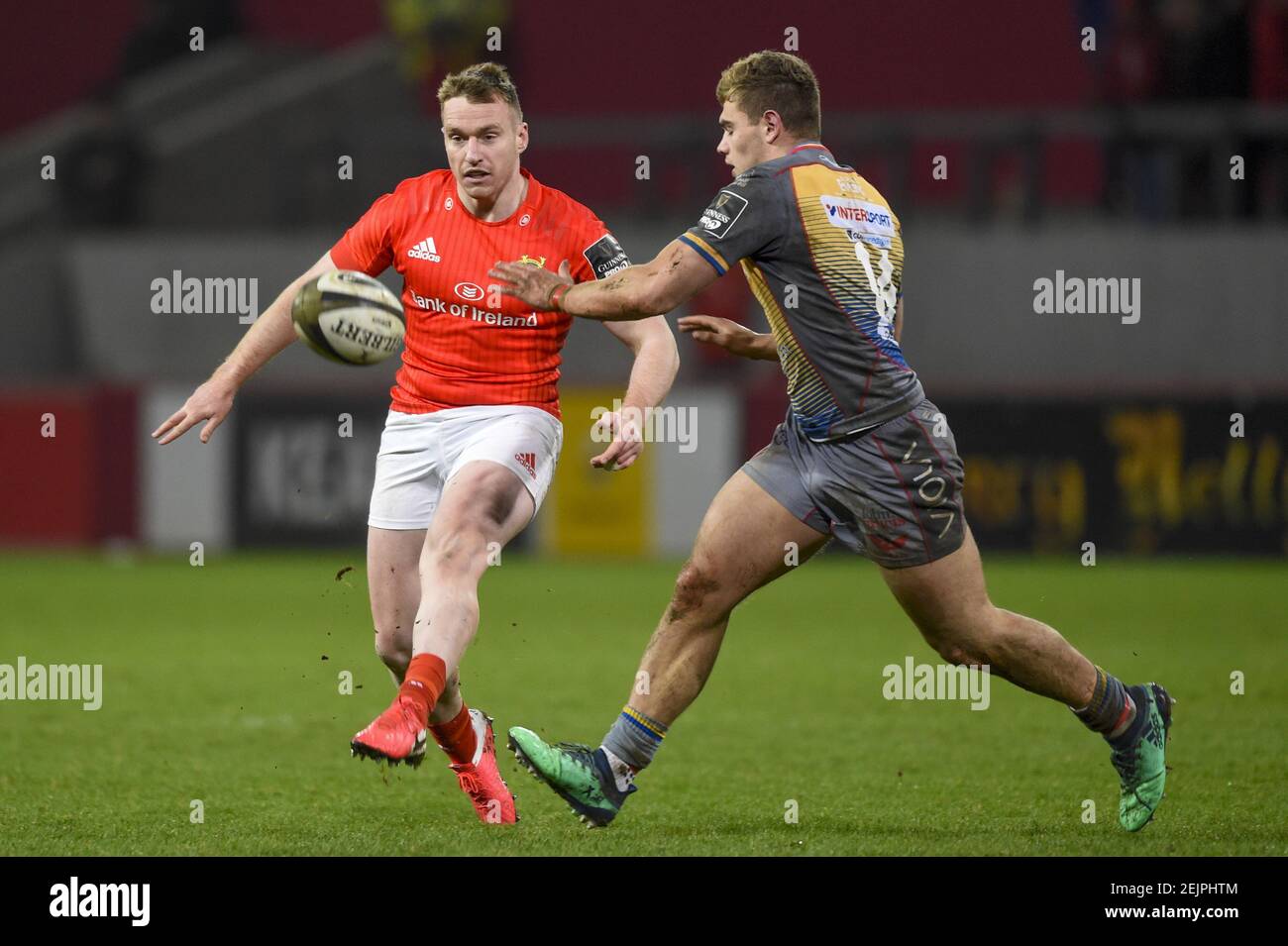 Rory Scannell of Munster and Corey Baldwin of Scarlets during the ...