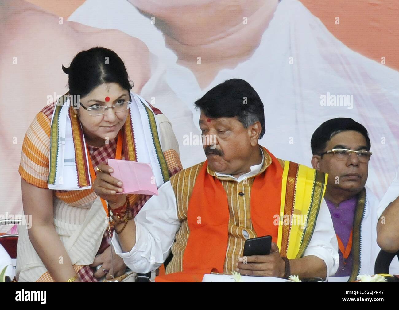 BJP National Secretary Kailash Vijayvargiya speaks to MP Locket Chatterjee during the Amit Shah ...
