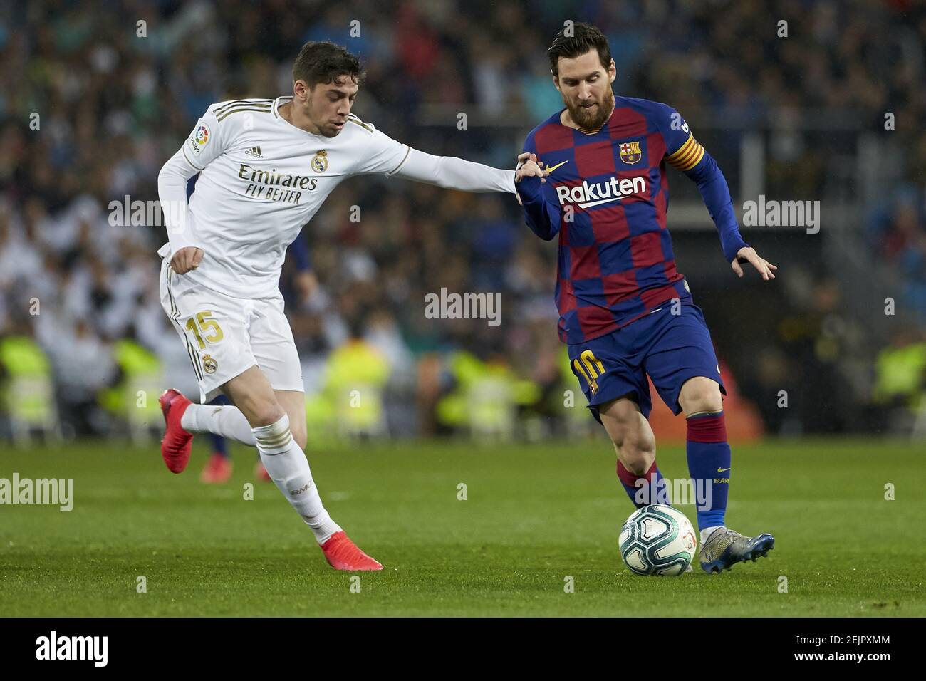 Fede Valverde of Real Madrid and Lionel Messi of FC Barcelona during ...