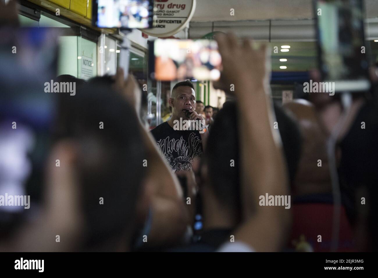 Hostage taker Archie Paray addresses the media before being subdued by ...
