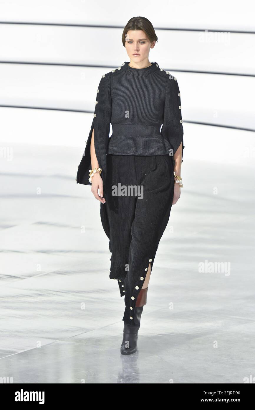 Model Vivienne Rohner walks on the runway at the Chanel fashion show ...