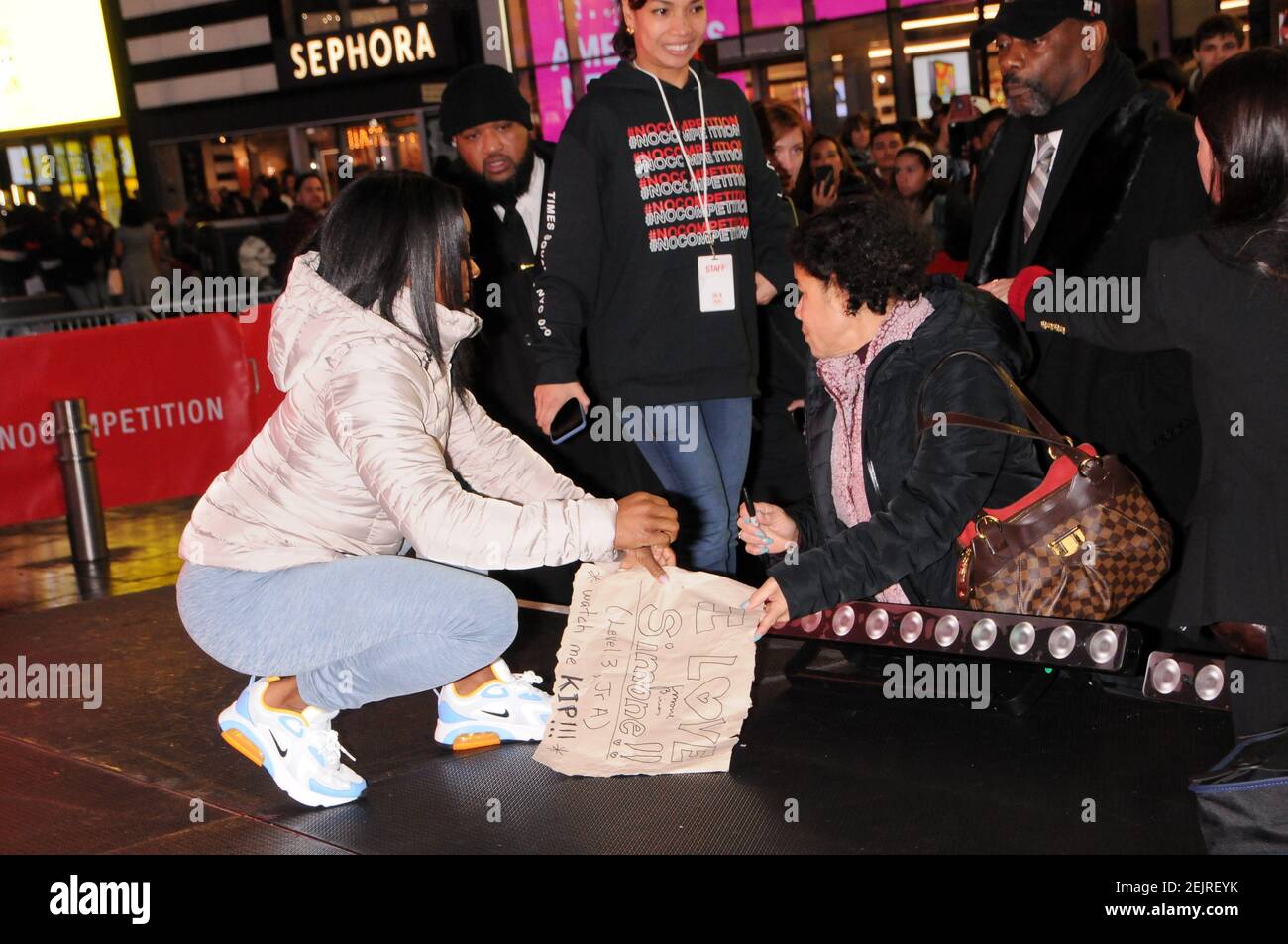 Simone Biles signs autographs during her promotion of skincare brand SK ...