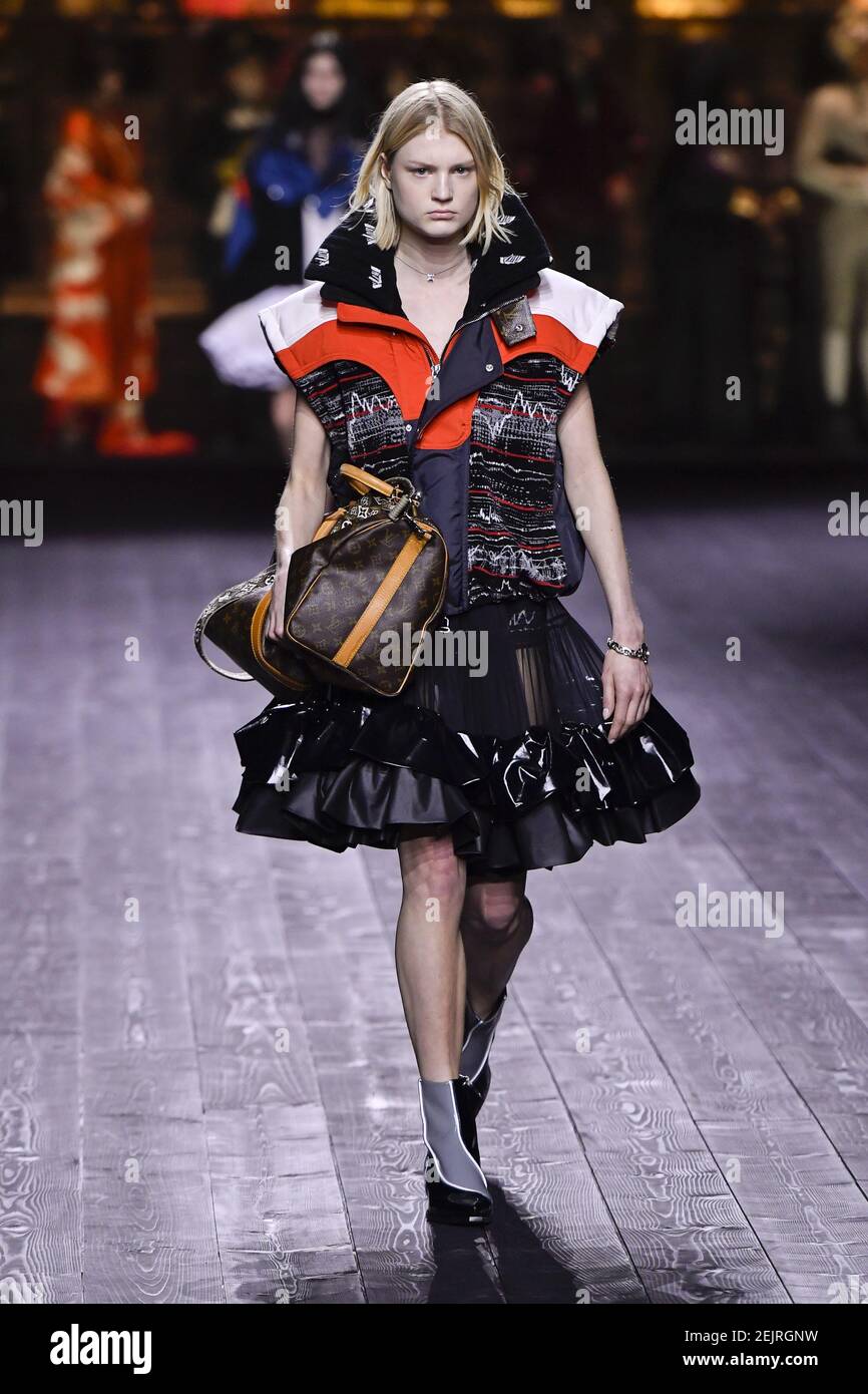Model Michelle Laff walks on the runway at the Louis Vuitton fashion ...