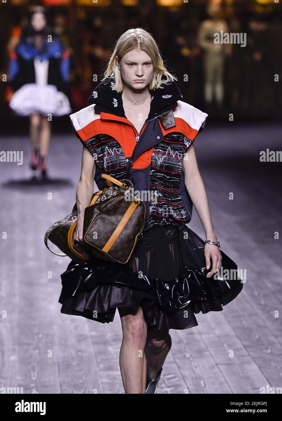 Model Michelle Laff walks on the runway at the Louis Vuitton fashion ...