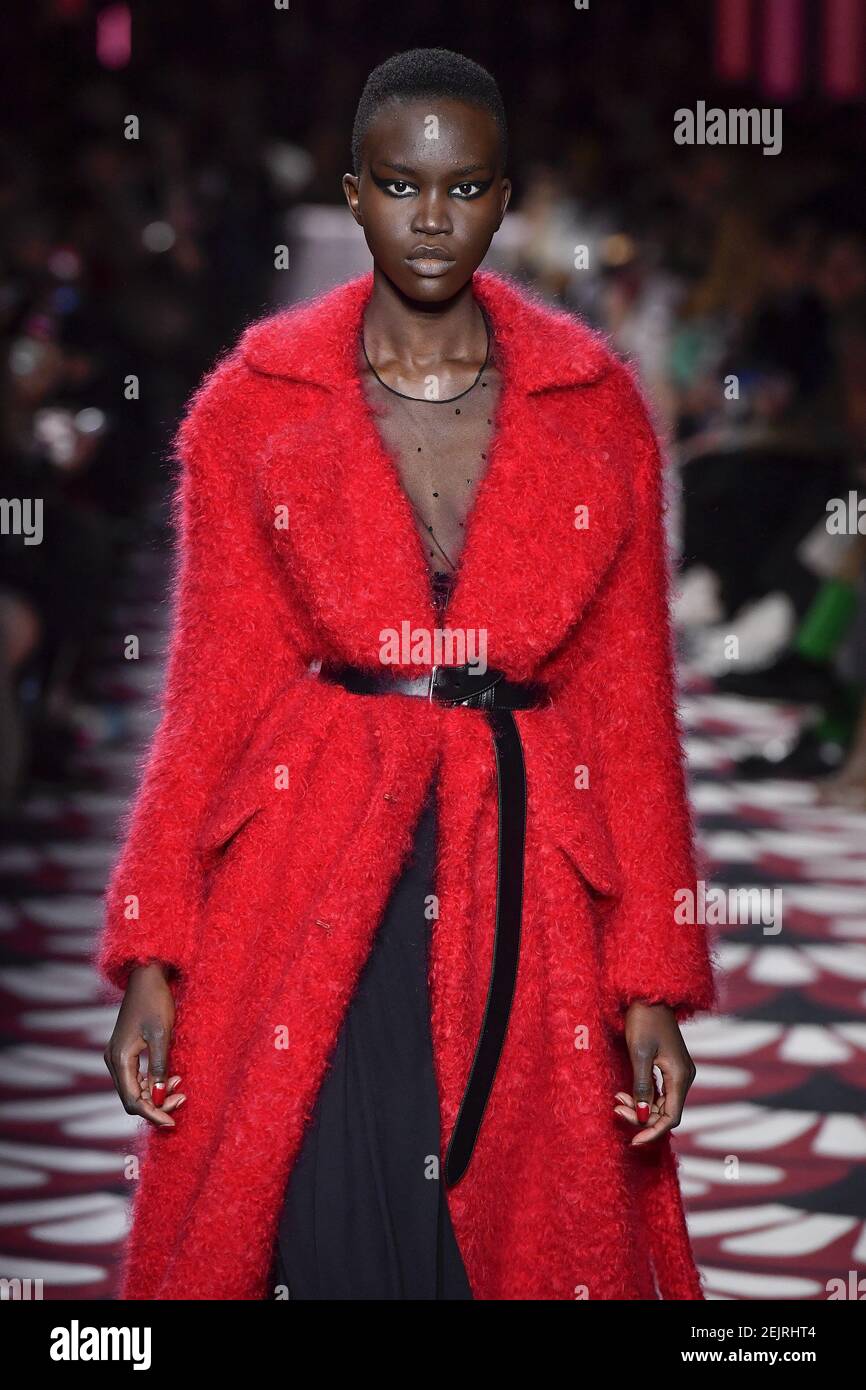 Model Achenrin Madit walks on the runway at the Miu Miu fashion show ...