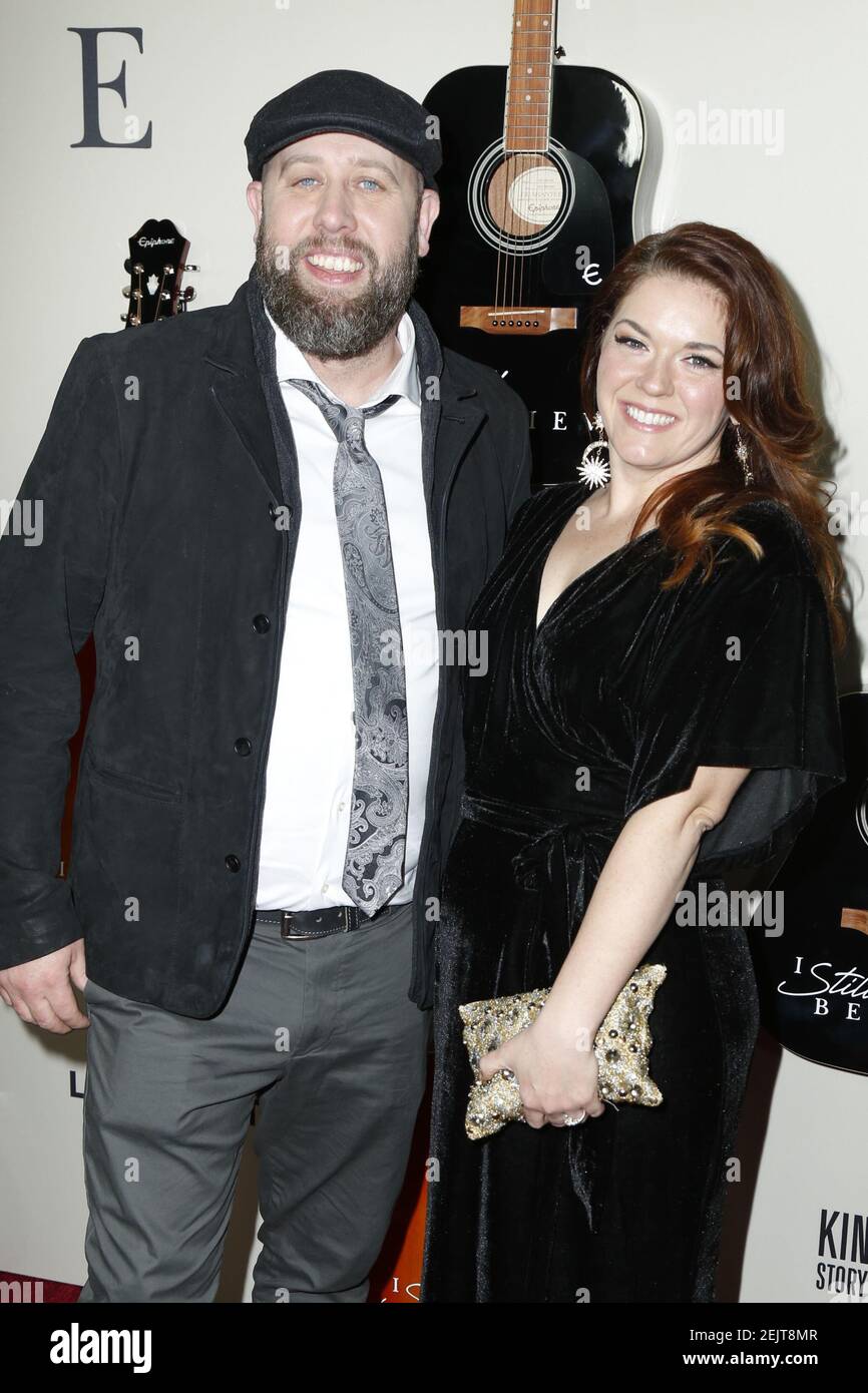 Andrew Erwin and guest walking the red carpet at the Premiere Of ...