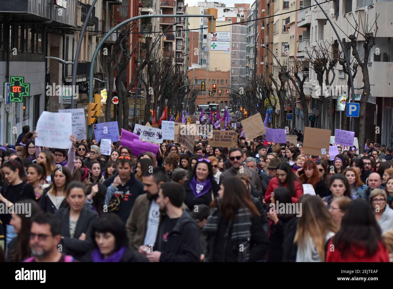 Crowd of people holding placards during the International Women's Day ...