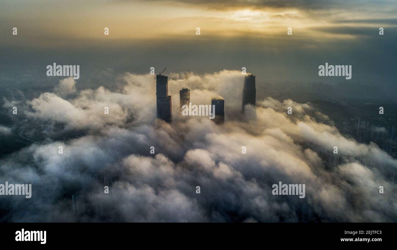 Guangxi ,CHINA-Tall buildings are shrouded in clouds in Nanning city ...