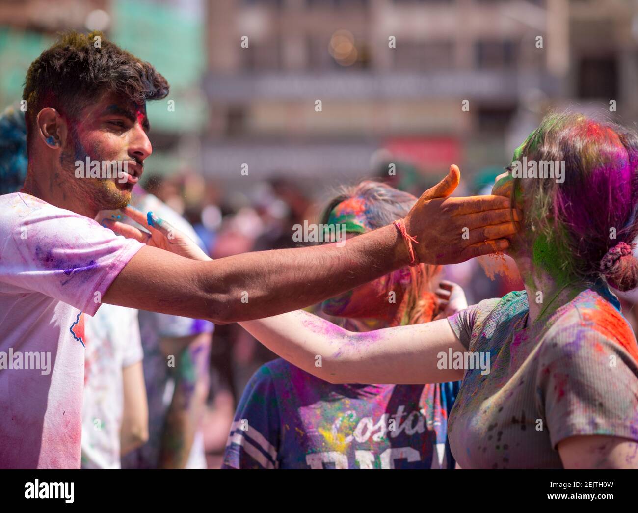 People apply Vermilion powder to one another during the festival. Holi ...