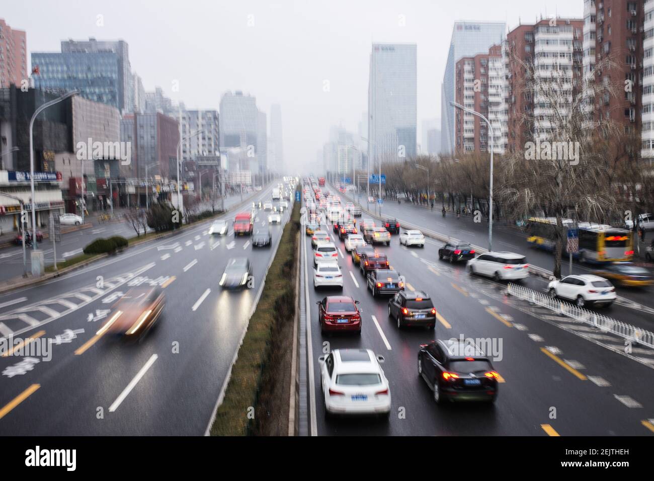 Traffic stream moves slowly during peak time of weekday commute ...