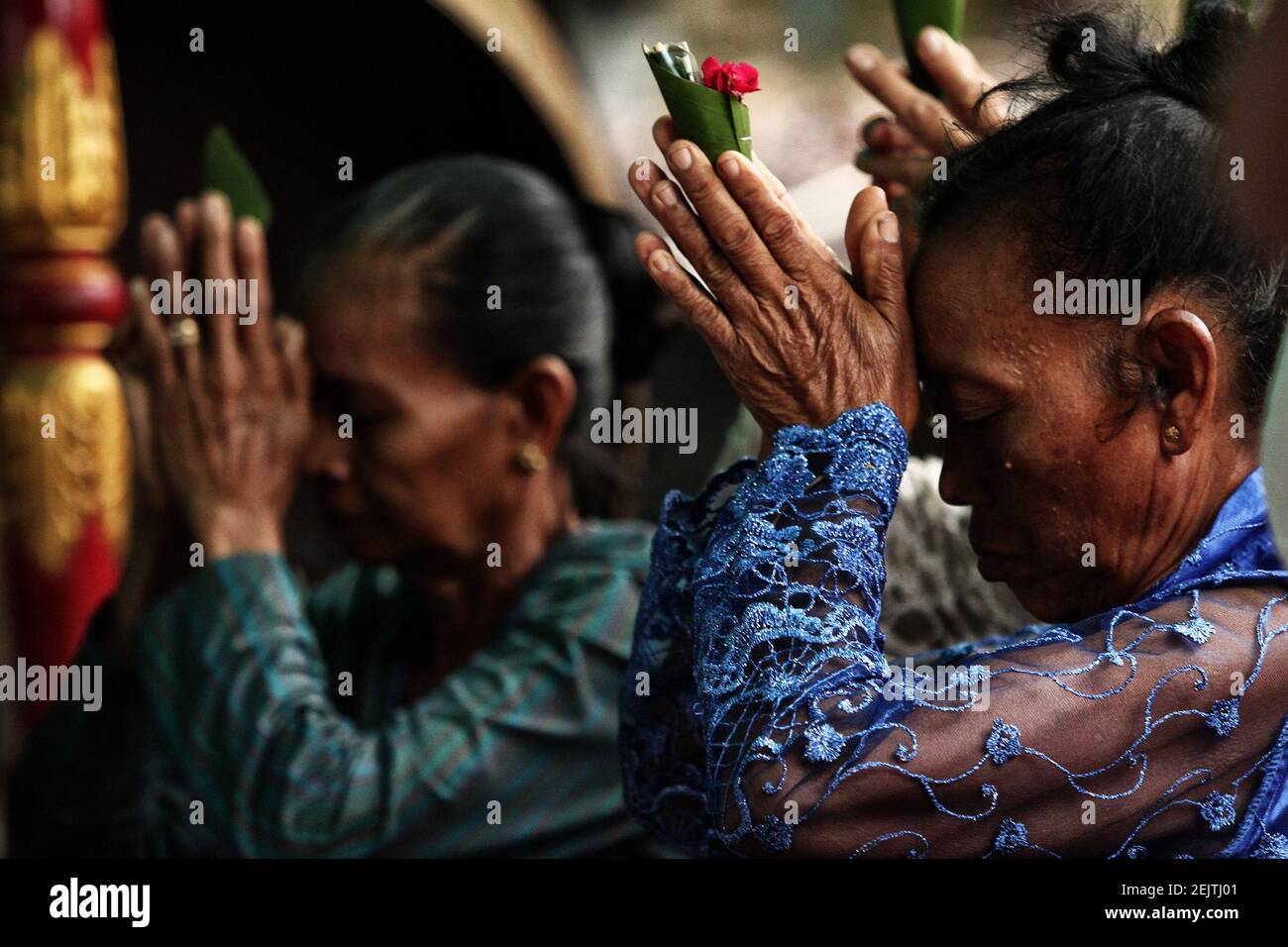 Javanese Hindus pray during the Melasti ceremony at Segara Wukir Temple ...