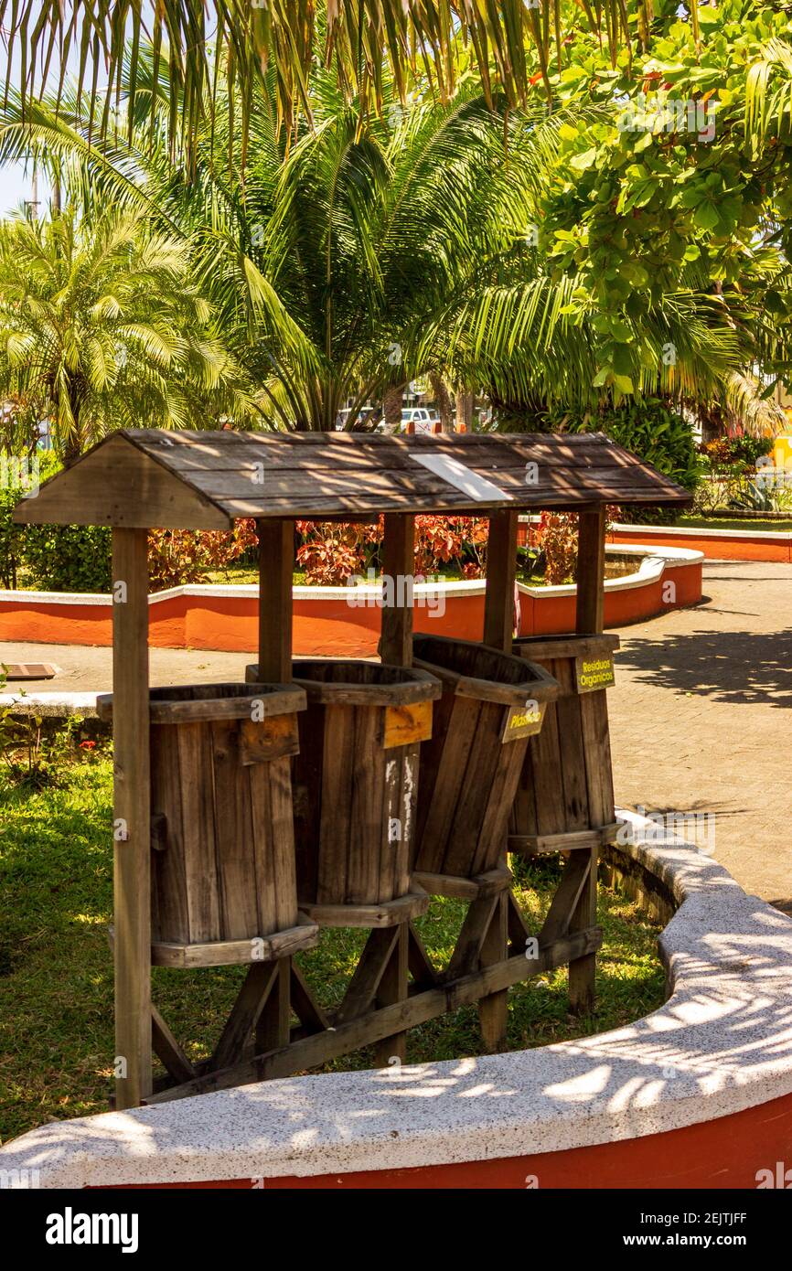 Public bins in a park in Jaco, Costa Rica; set up for collecting trash ...