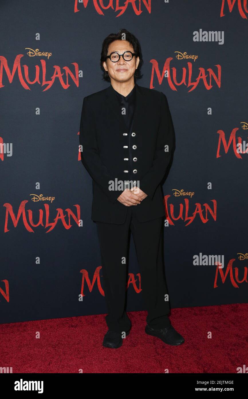 Jet Li walking the red carpet at Premiere Of Disney's "Mulan" held at ...