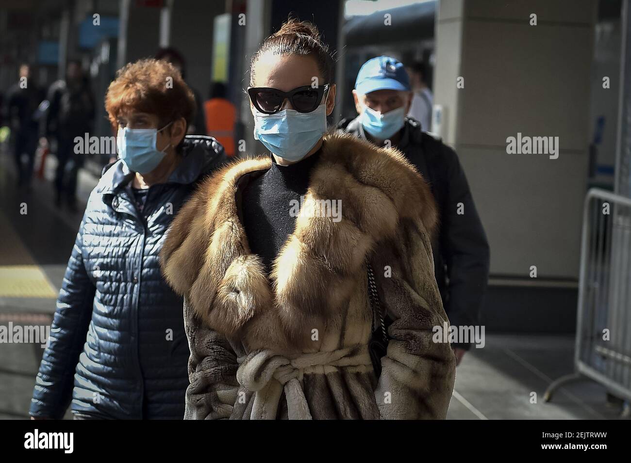 TURIN, ITALY - March 10, 2020: Passengers wearing respiratory masks ...