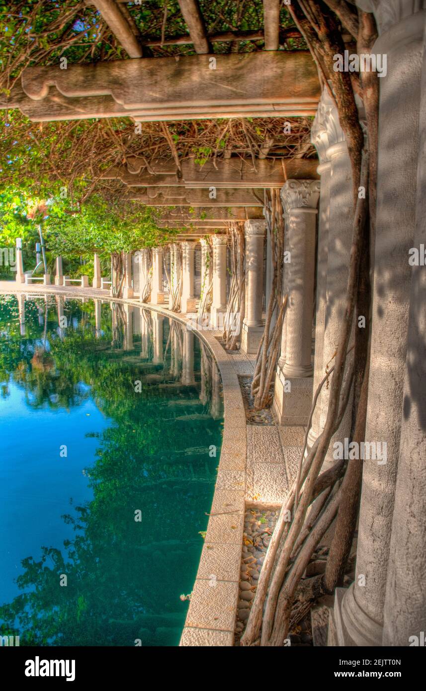 The colonnade backed by marble panels with victim names at the ...