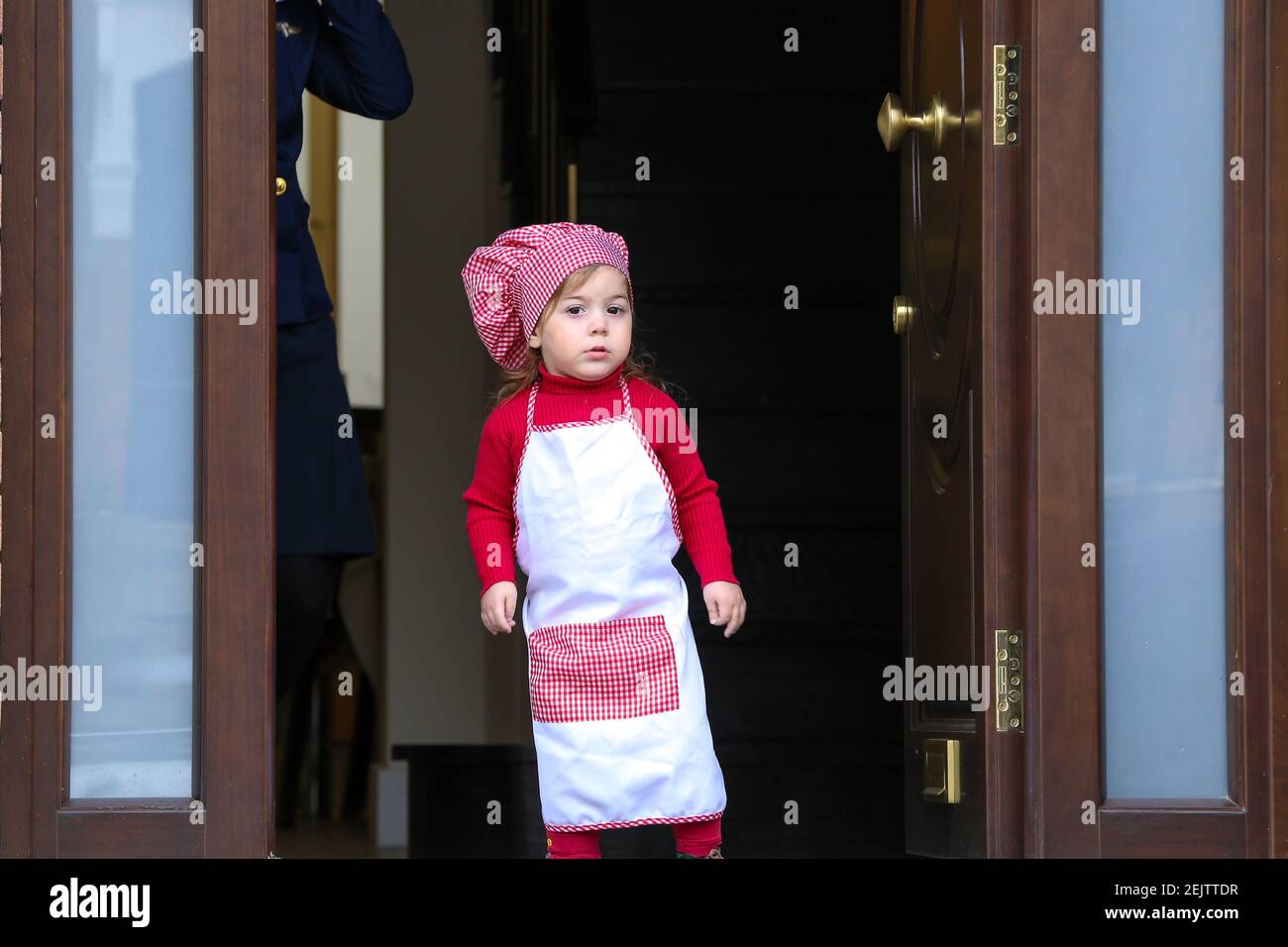 An Orthodox Jewish child dressed in a chef costume during the event ...