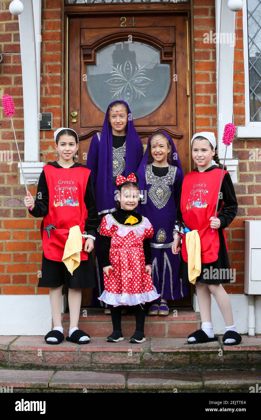 Orthodox Jewish children pose in fancy dresses during the event ...