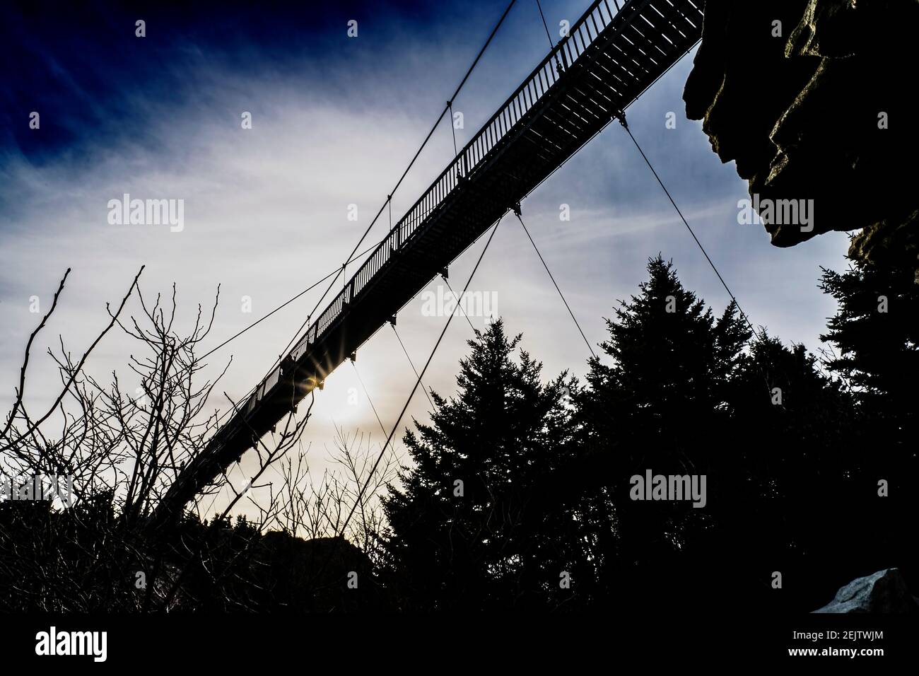 The mile high swinging bridge silhouetted against the sky at ...