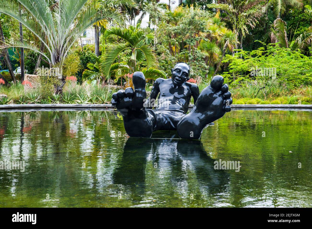 The symbolic statue of an African, Big Foot, in a pond at the Miami ...